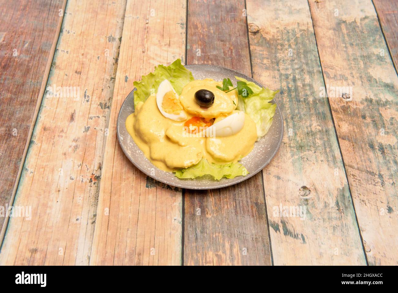 Huancaína sauce is a Peruvian sauce made with yellow chili pepper and ...