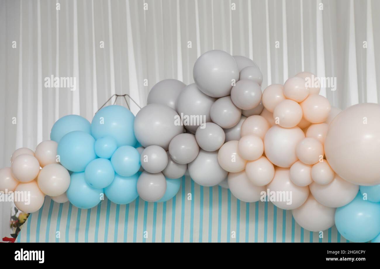 Many colorful balloons decorated wall as background. Beautiful ...