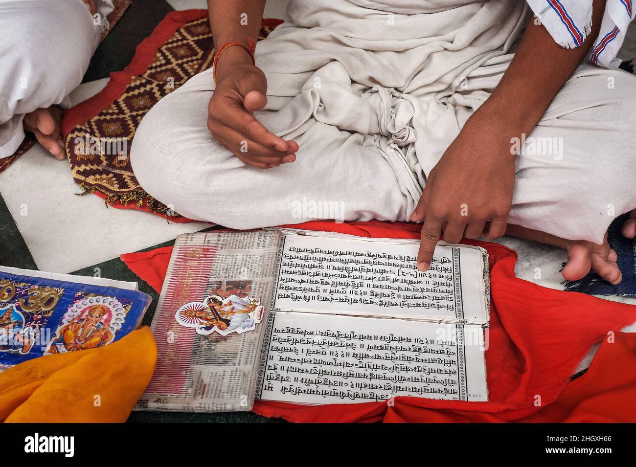 Students of a Hindu ashram (religious school) study sacred texts ...