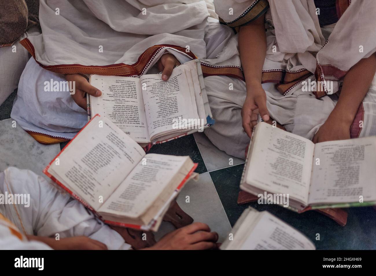 Students of a Hindu ashram (religious school) study sacred texts ...