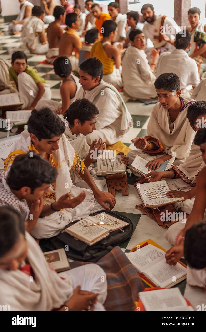 Students of a Hindu ashram (religious school) study sacred texts ...