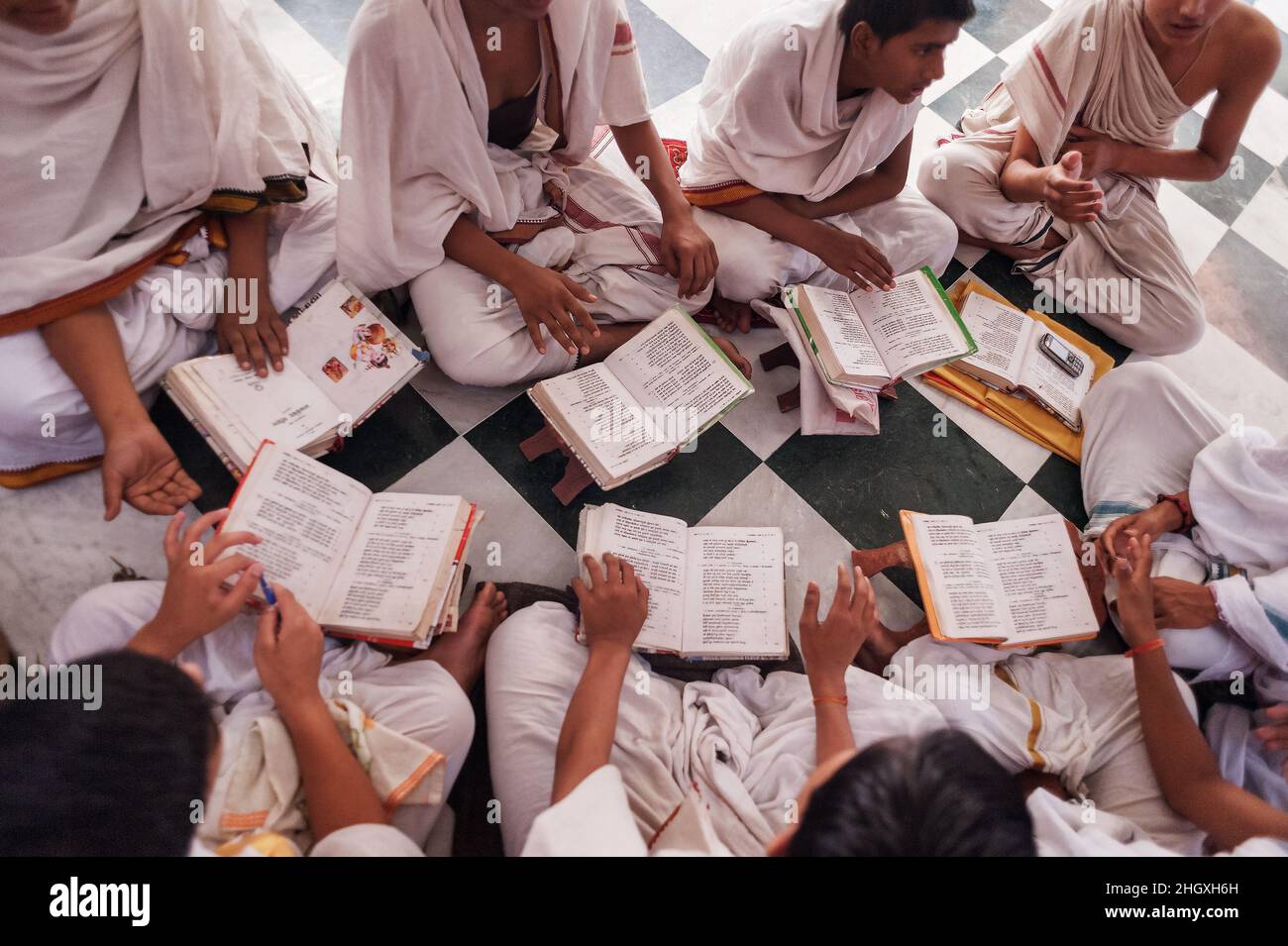 Students of a Hindu ashram (religious school) study sacred texts ...