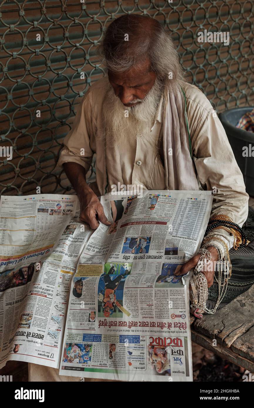 Indian People Reading Newspaper
