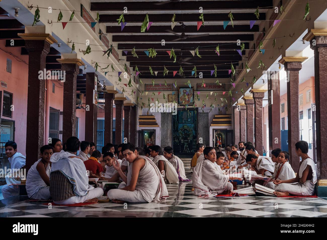 Students of a Hindu ashram (religious school) study sacred texts ...