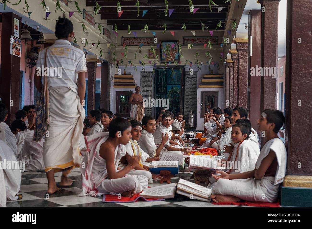 Students of a Hindu ashram (religious school) study sacred texts ...