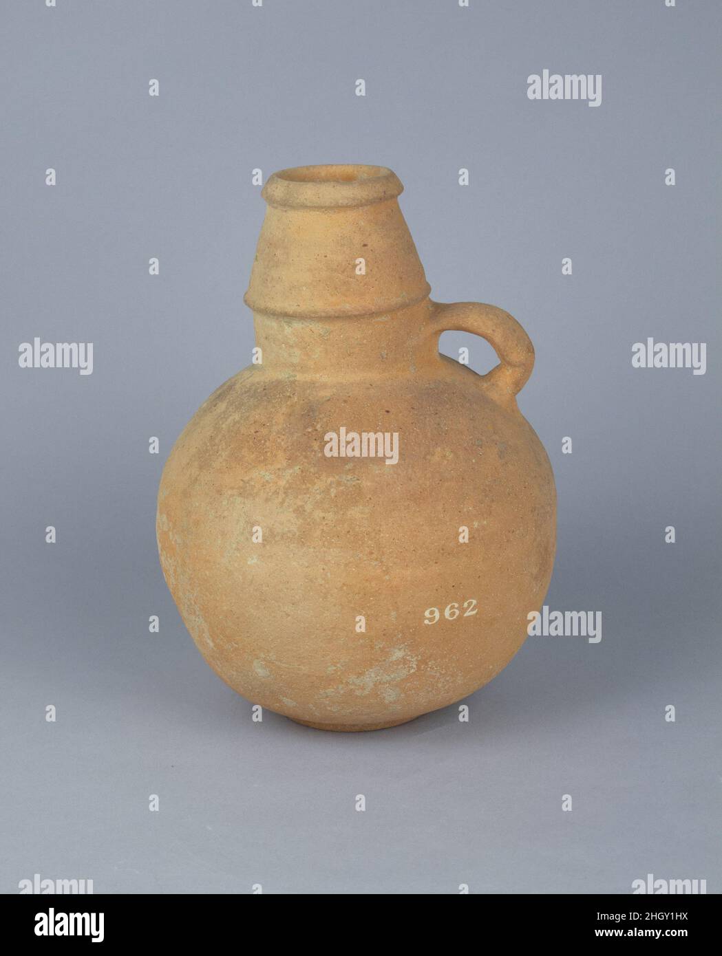Terracotta jug Cypriot Handle-ridge jug of unpainted clay.. Terracotta ...