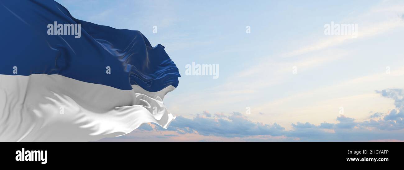 flag of Assen , Netherlands at cloudy sky background on sunset ...