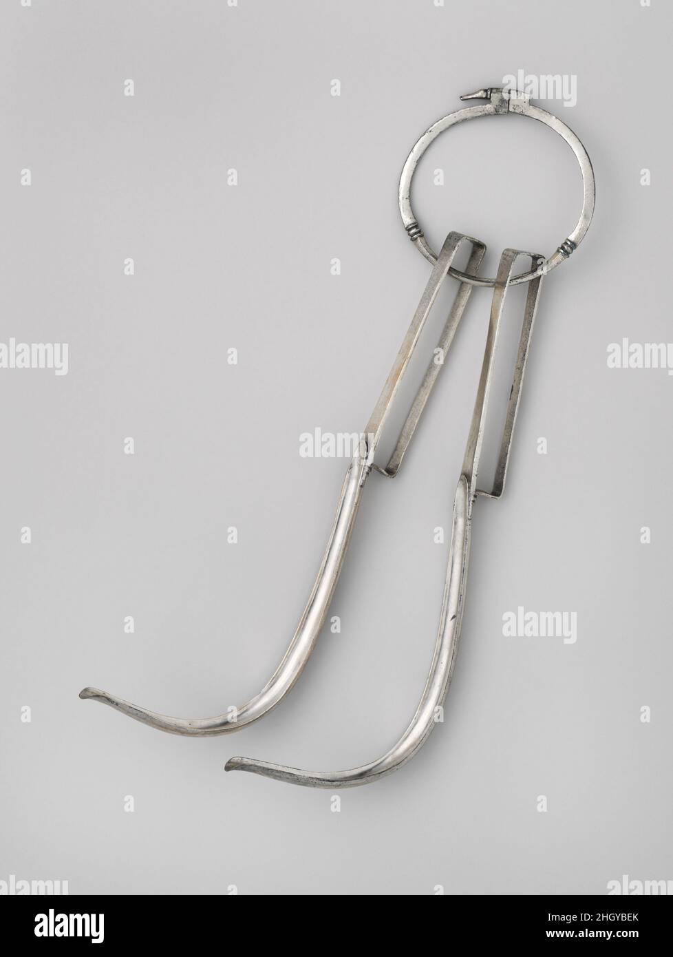 Pair of silver strigils (scrapers) on a carrying ring mid-1st century B ...