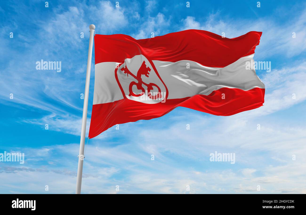 flag of Leiden , Netherlands at cloudy sky background on sunset ...