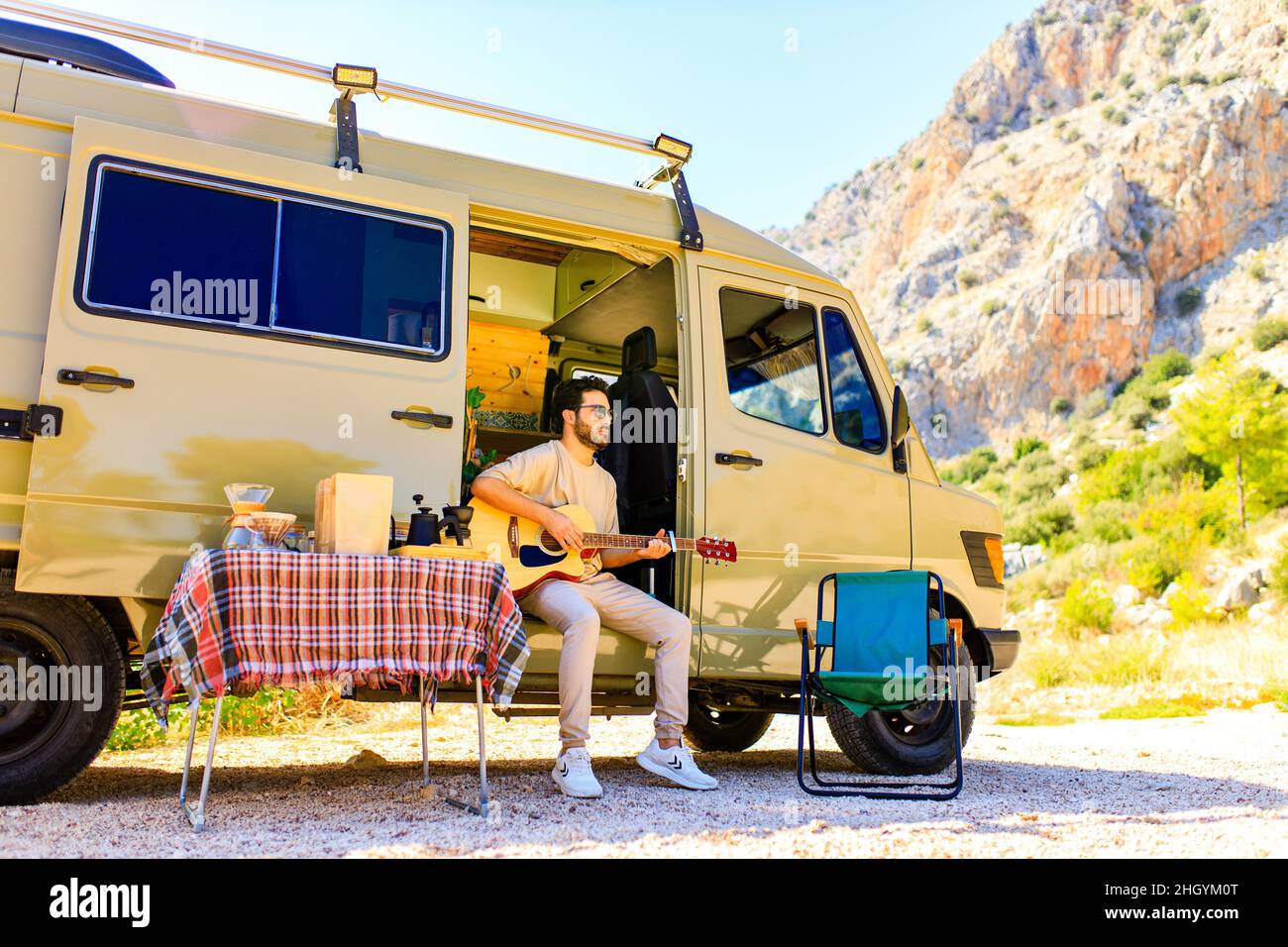 young indian man vacation travel RV, holiday trip in motorhome in ...