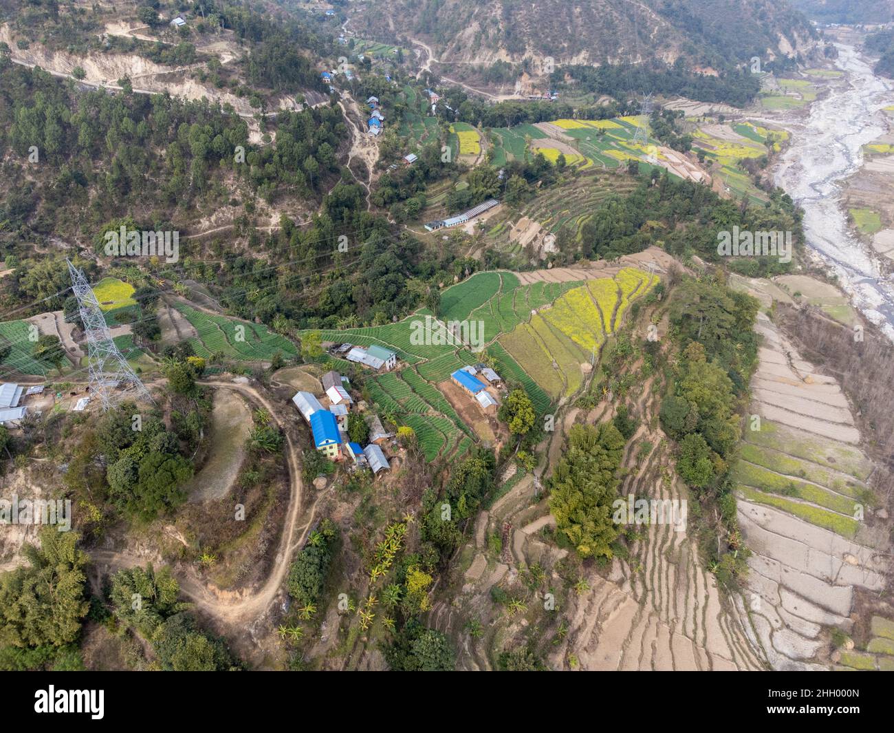 An aerial view of terraces and fields on a hillside in Nepal Stock ...