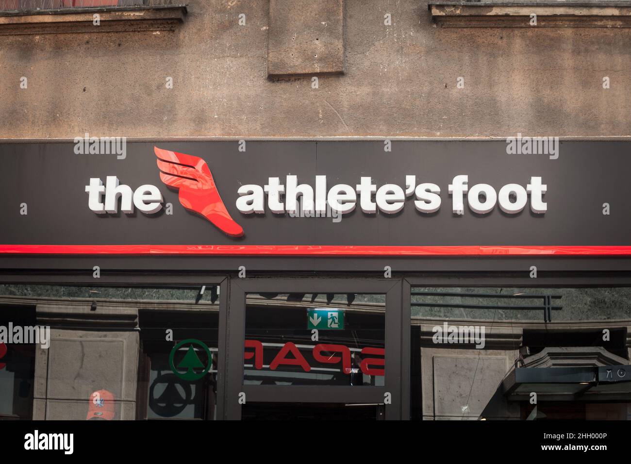 Picture of a sign with the Athelte's foot logo on their store in a ...
