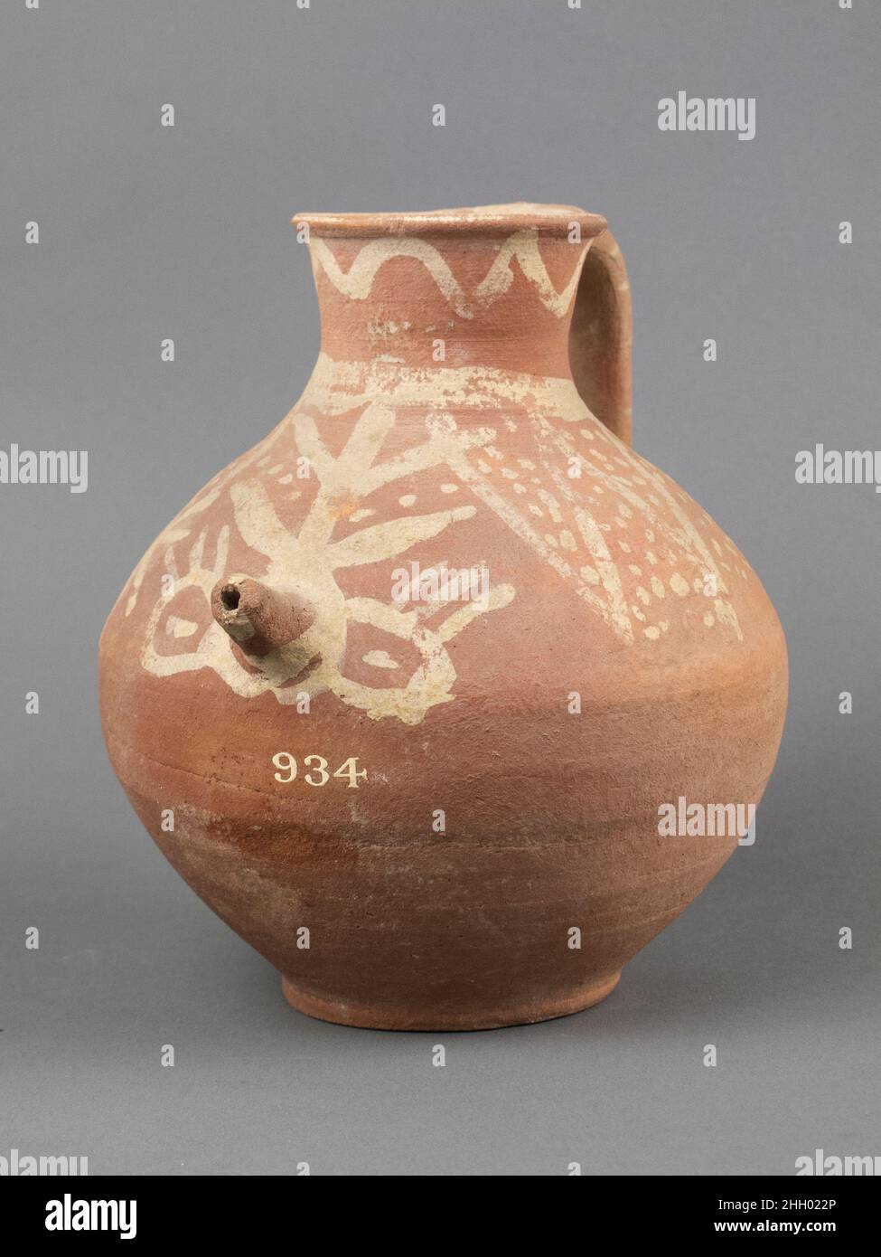 Jug Cypriot Jug with spout, and body painted, in white, as a face with ...