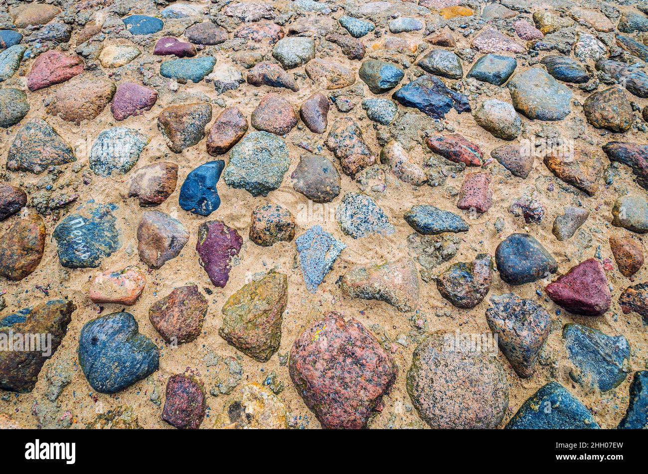Ancient paving stones in rare stones in the sand Stock Photo - Alamy