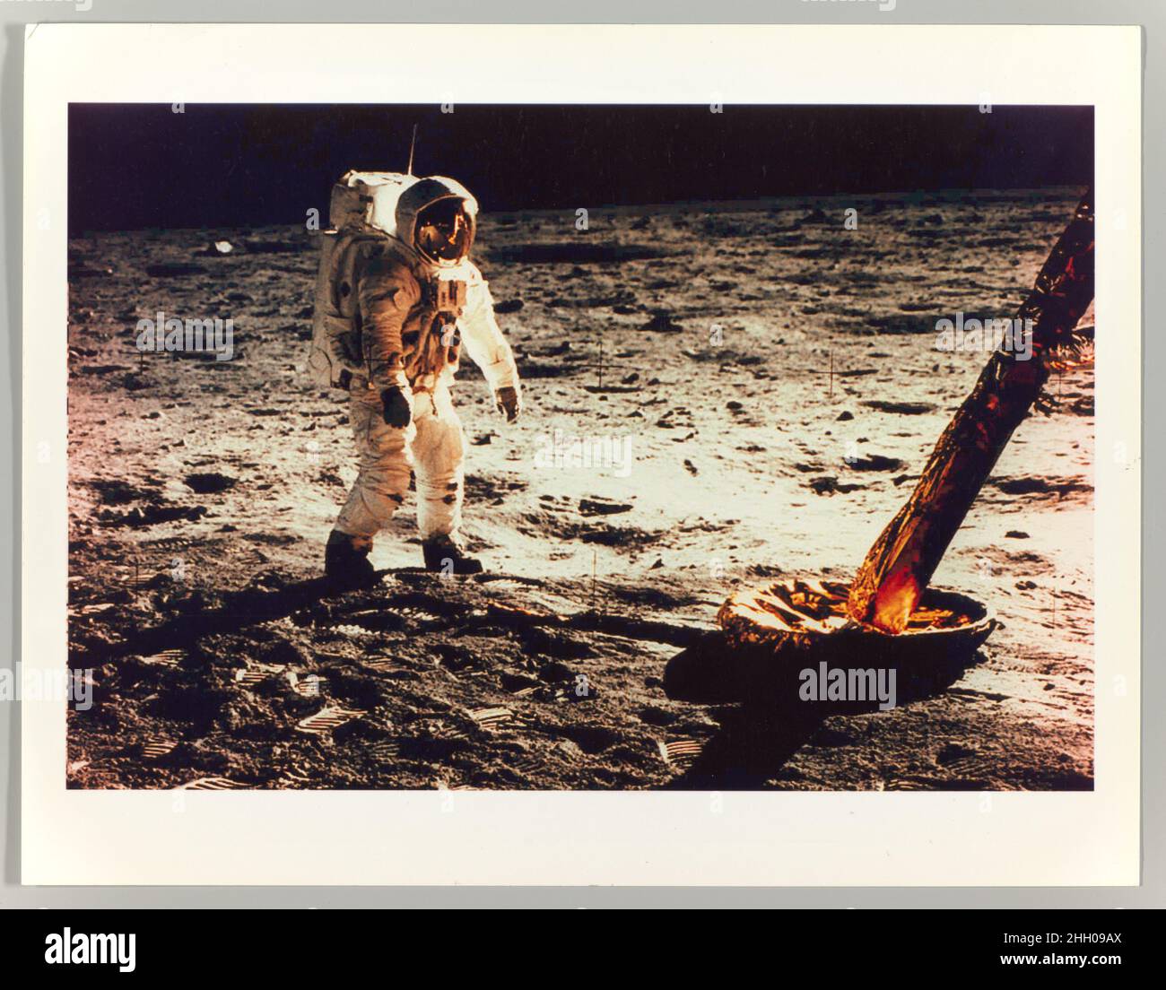 Buzz Aldrin Walking on the Surface of the Moon Near a Leg of the Lunar ...
