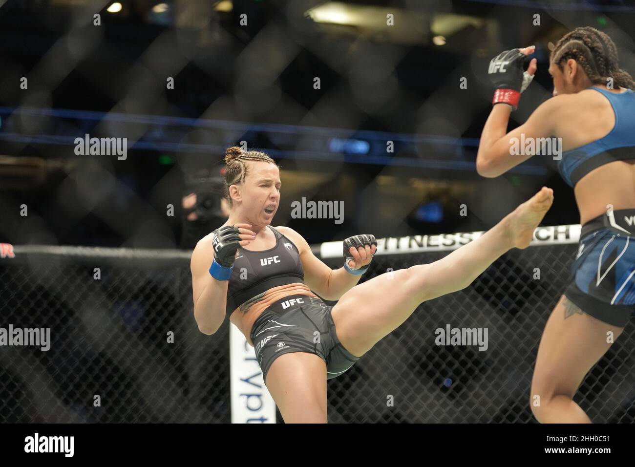 ANAHEIM, CA - JANUARY 22: (L-R) Vanessa Demopoulos kicks Silvana Juarez ...