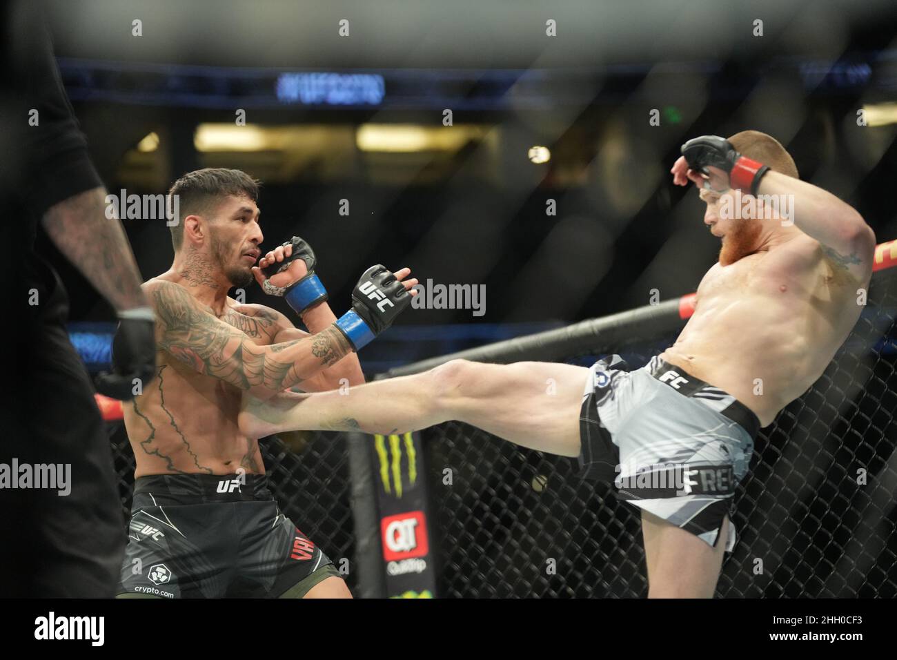 ANAHEIM, CA - JANUARY 22: (R-L) Matt Frevola kicks Genaro Valdéz in ...