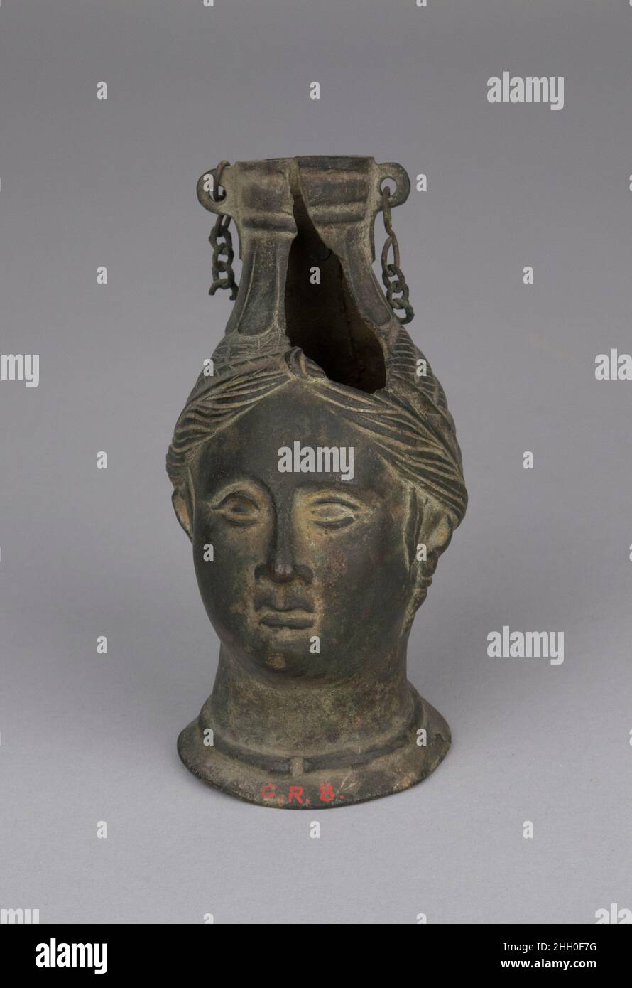 Rhyton in the form of a female head. Rhyton in the form of a female ...