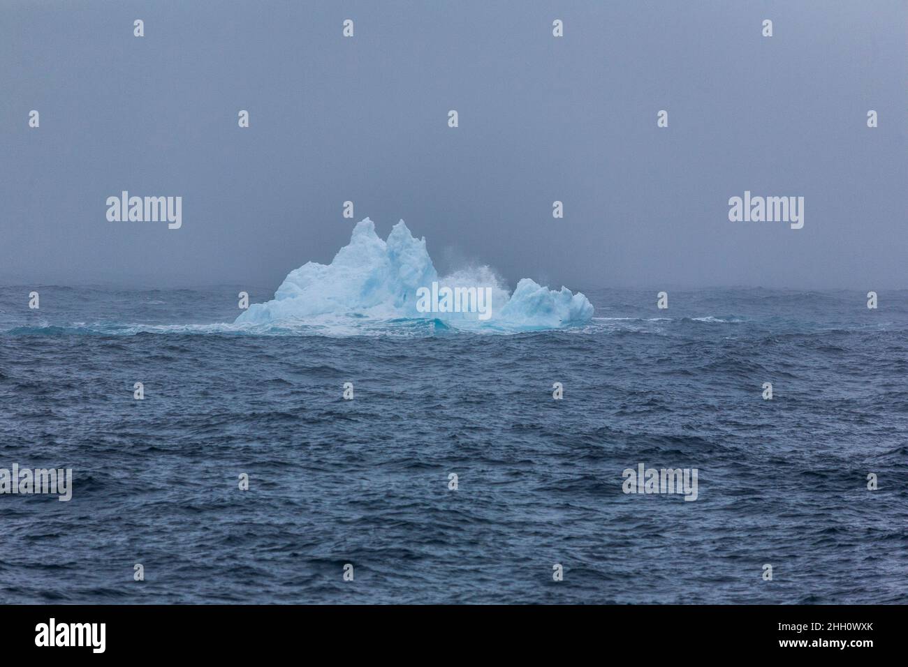 An iceberg breaking up ion the Southern Ocean between Macquarie Island ...