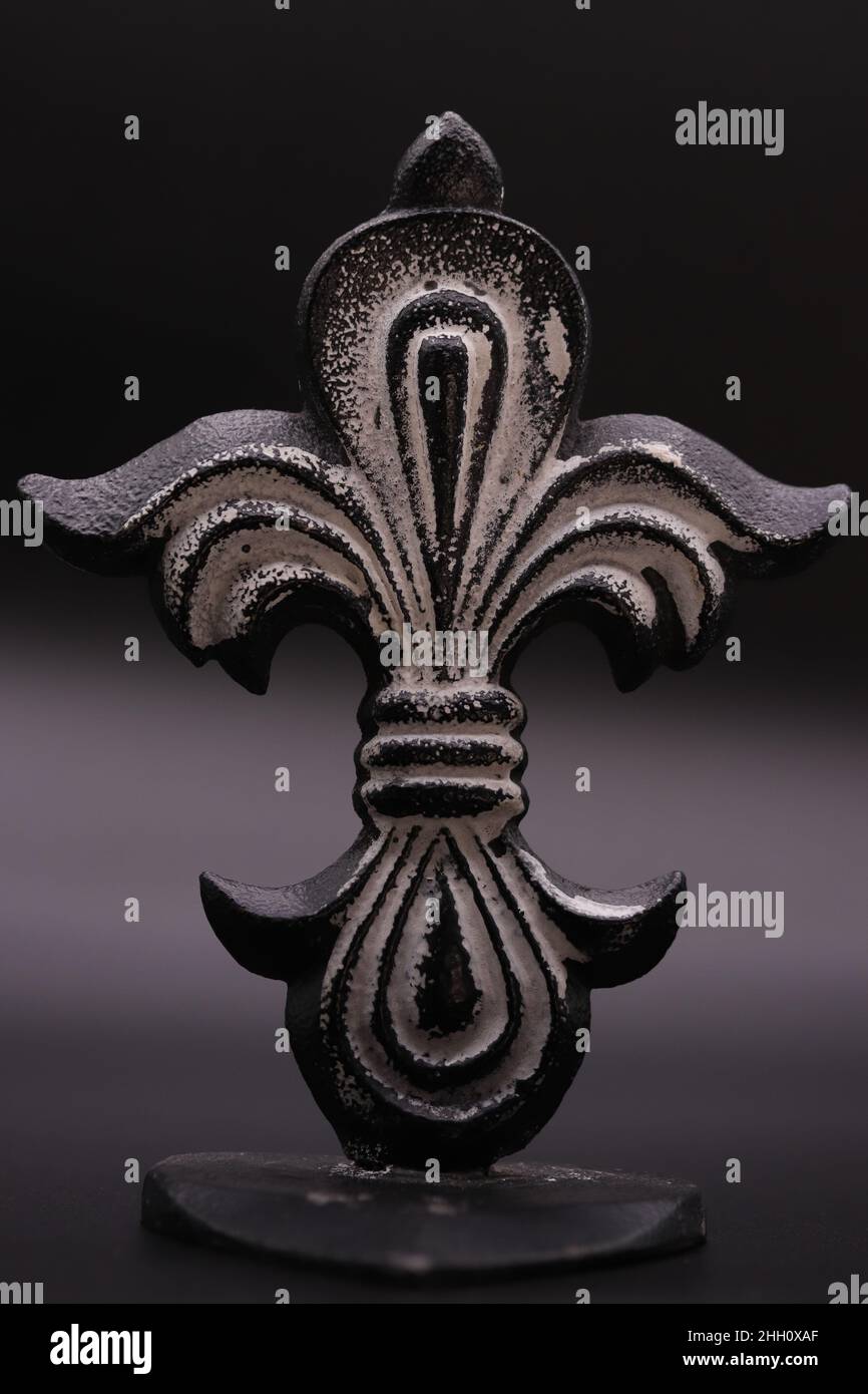 decorative fleur de lis in cast iron Stock Photo - Alamy