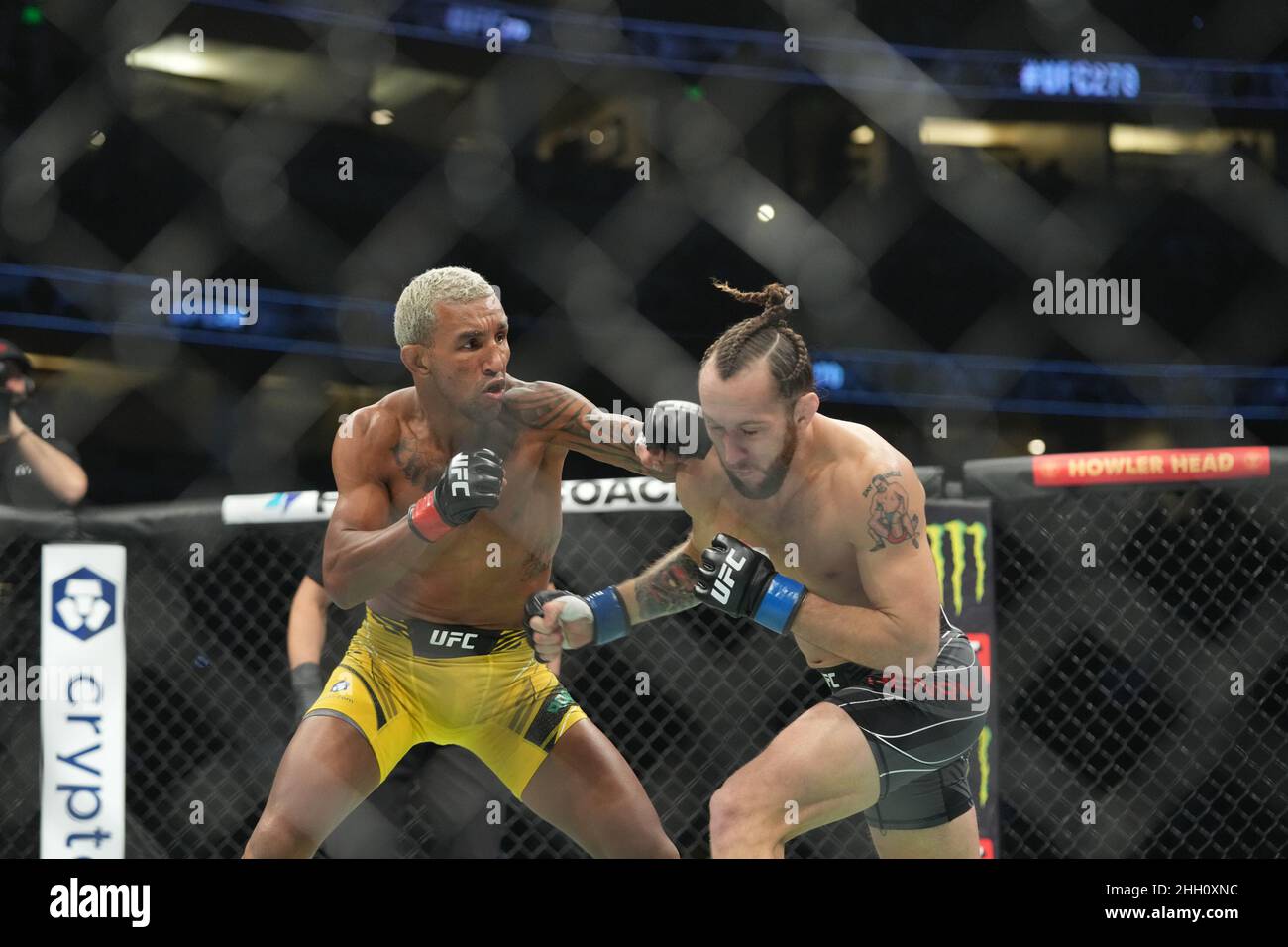 ANAHEIM, CA - JANUARY 22: (L-R) Raoni Barcelos punches Victor Henry in ...