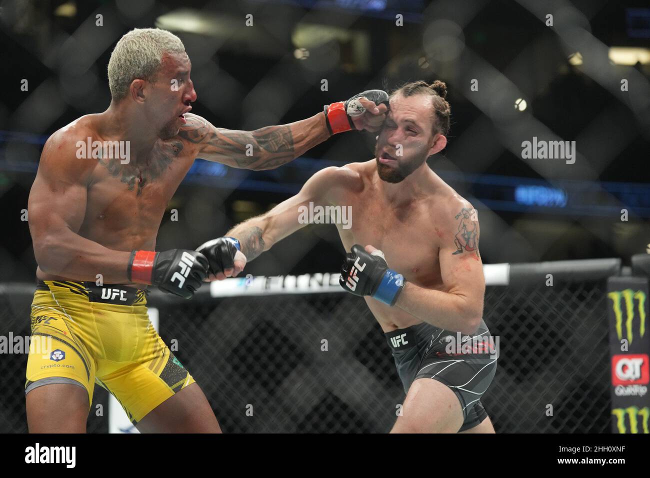 ANAHEIM, CA - JANUARY 22: (L-R) Raoni Barcelos punches Victor Henry in ...