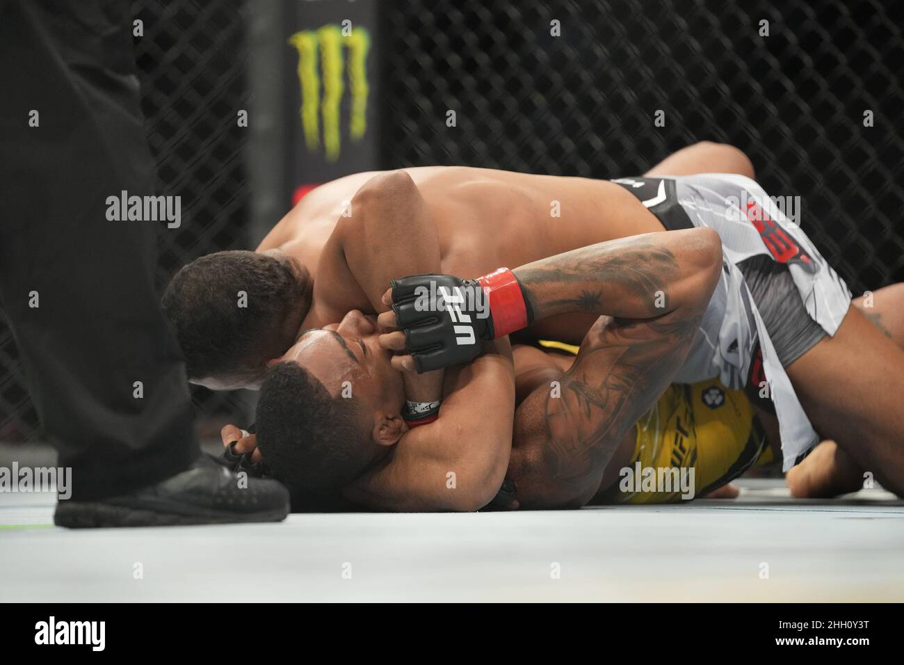 ANAHEIM, CA - JANUARY 22: Trevin Giles (top) controls the body of ...