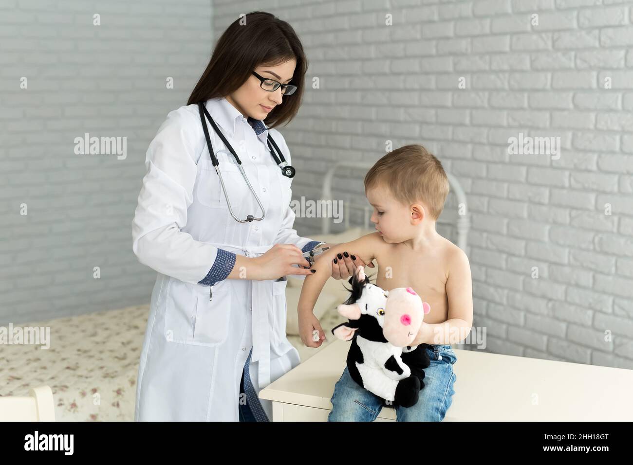 Doctor Giving Child Intramuscular Injection High Resolution Stock ...