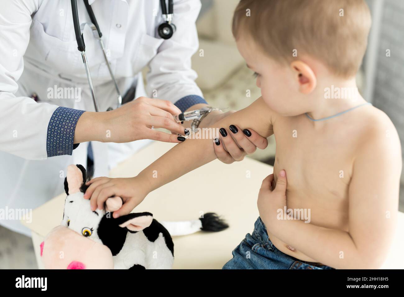 Doctor Giving Child Intramuscular Injection High Resolution Stock ...