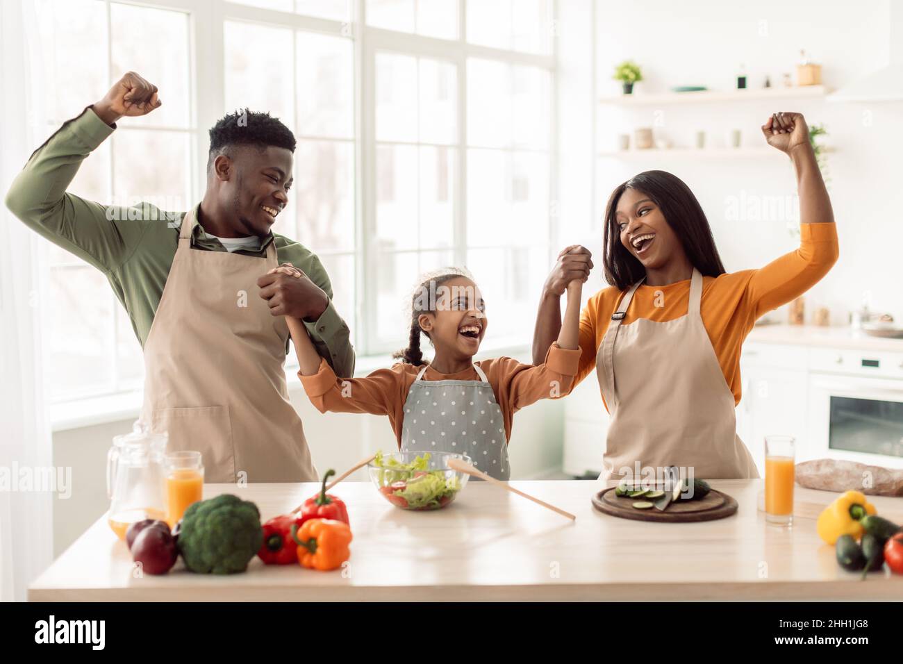 Husband hold wife in kitchen hi-res stock photography and images - Alamy