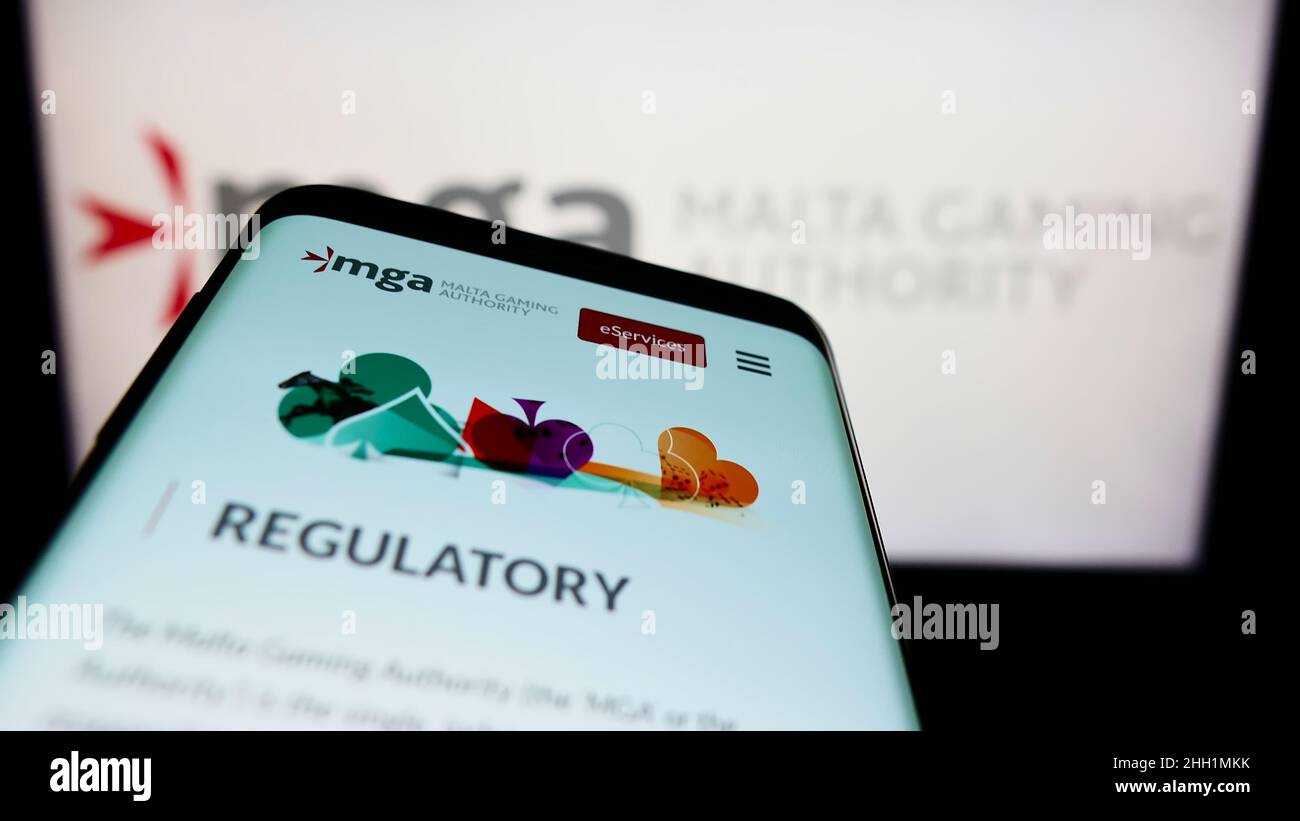 Mobile phone with website of Maltese institution Malta Gaming Authority ...