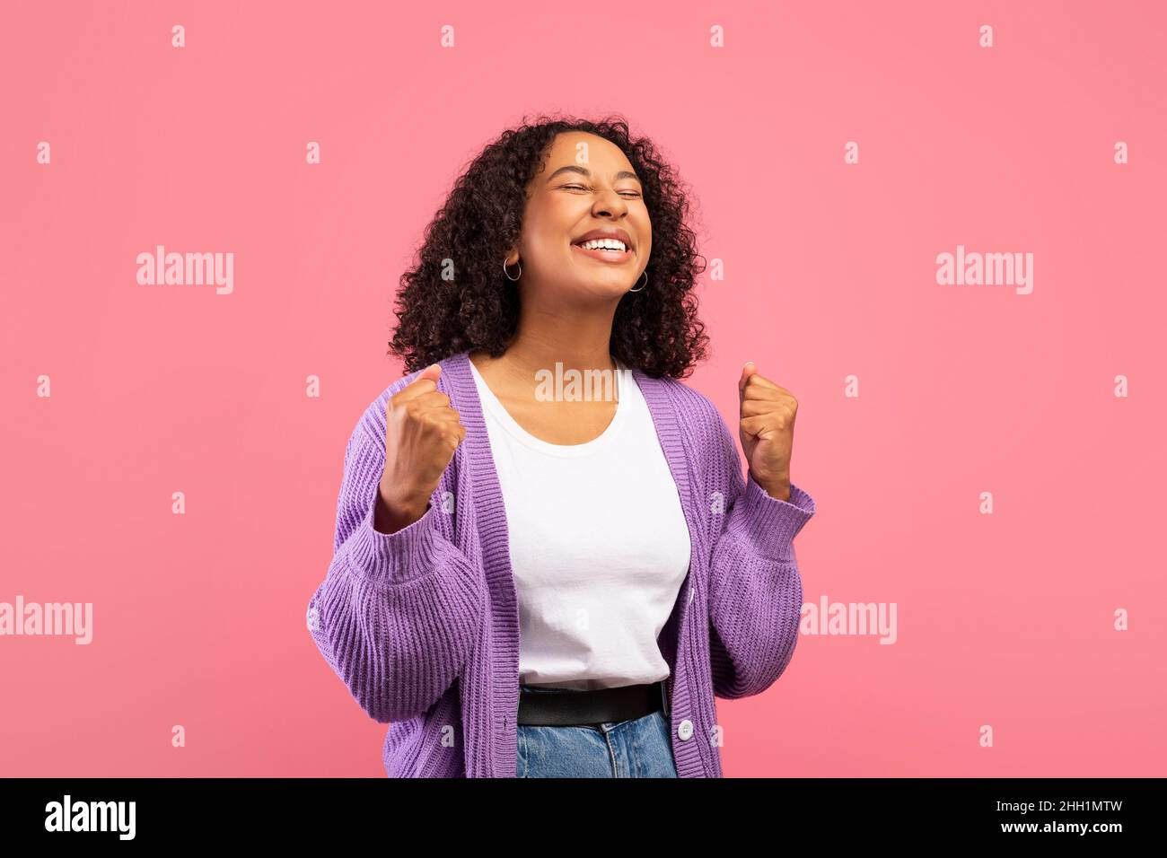 Lovely African American woman making YES gesture, celebrating huge win ...