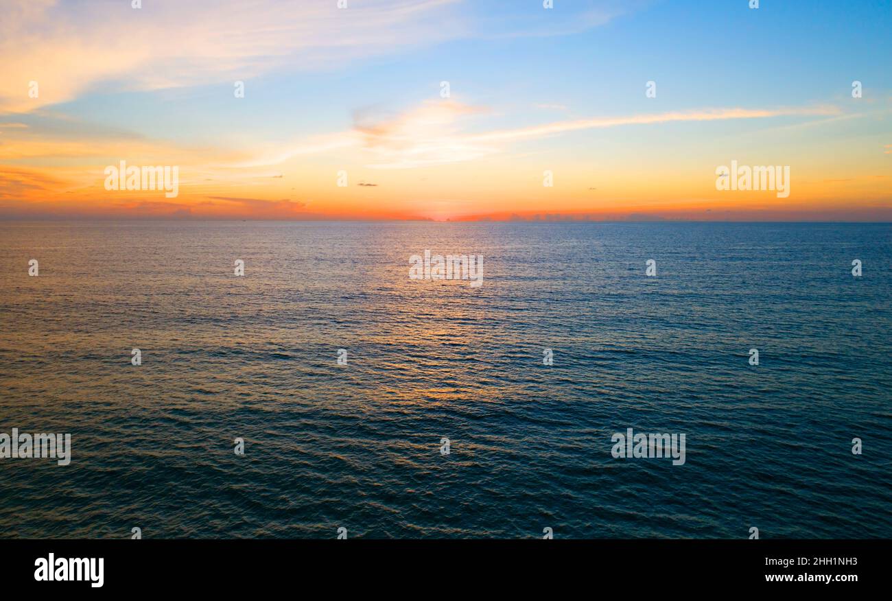 Aerial view Beautiful view sunset over sea surface beautiful wave ...