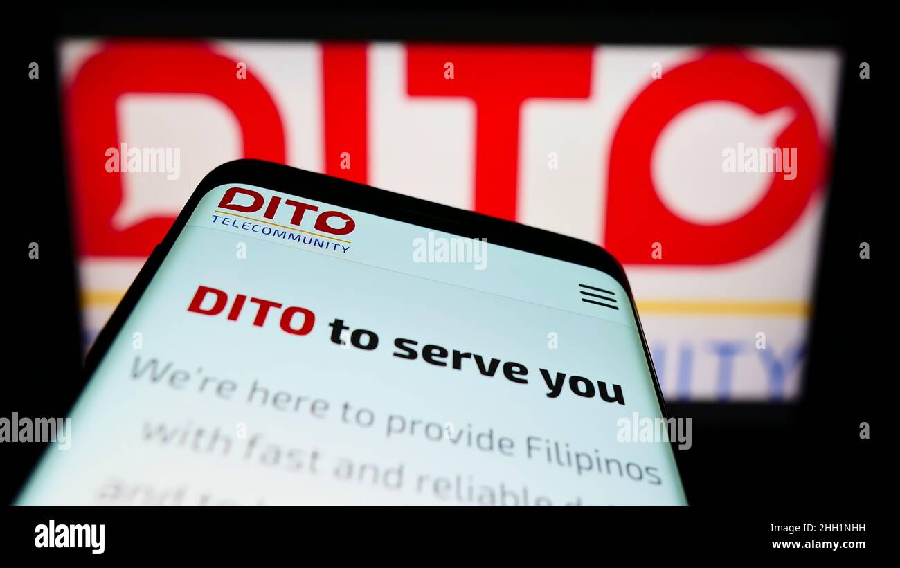 Mobile phone with webpage of Philippine company Dito Telecommunity ...