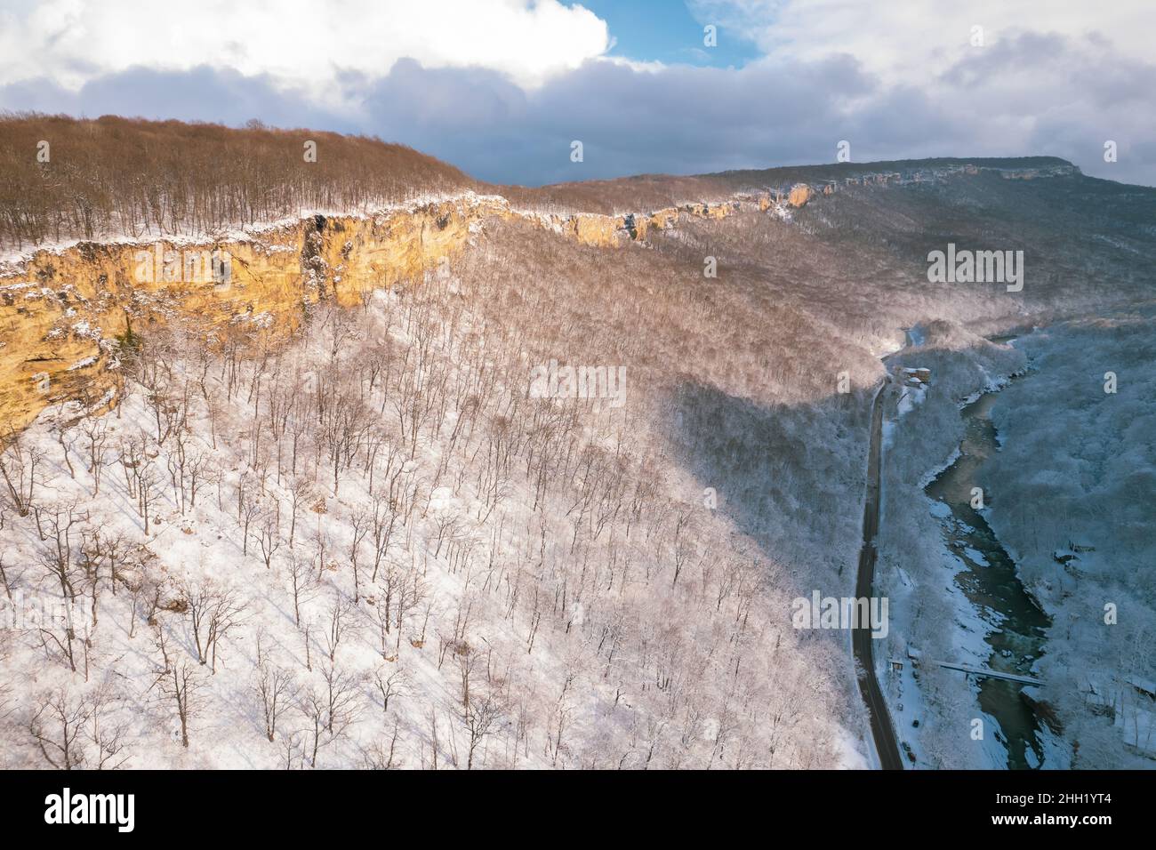 Aerial view of Plateau Lago-Naki mountain twisted road in the winter ...