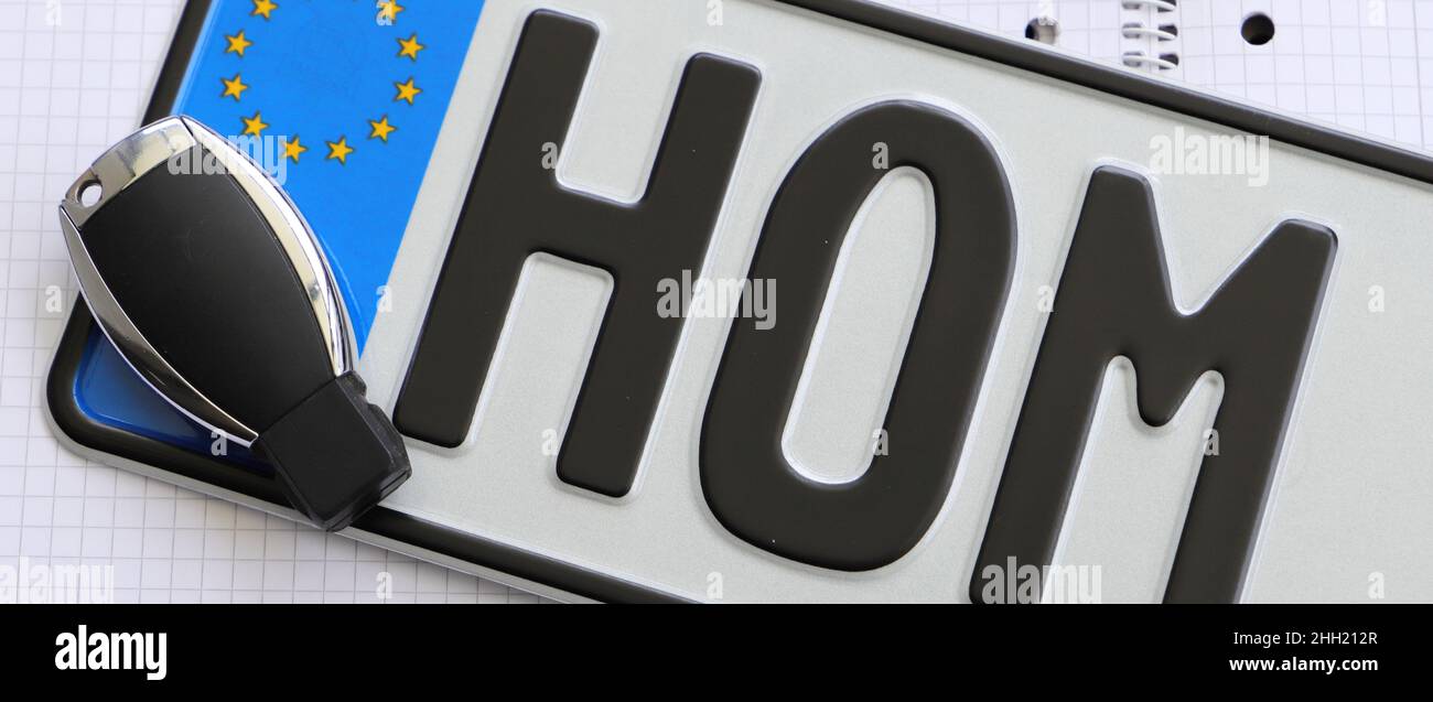 License plate with a car key Stock Photo - Alamy