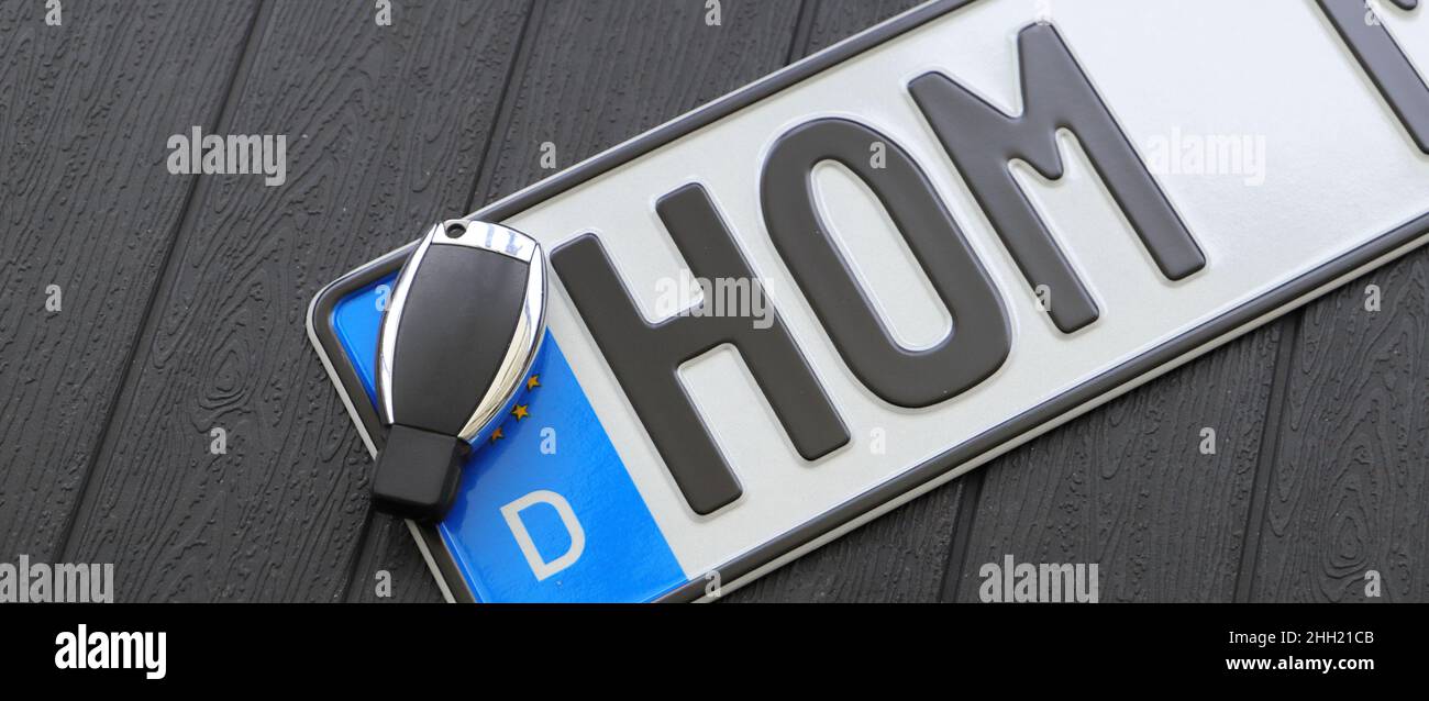 License plate with a car key Stock Photo - Alamy