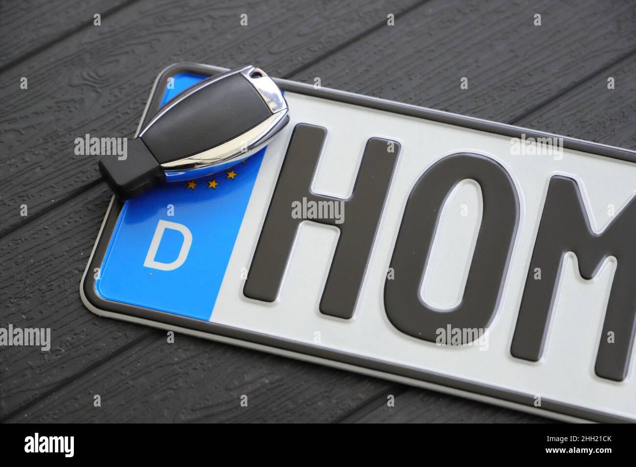 License plate with a car key Stock Photo - Alamy
