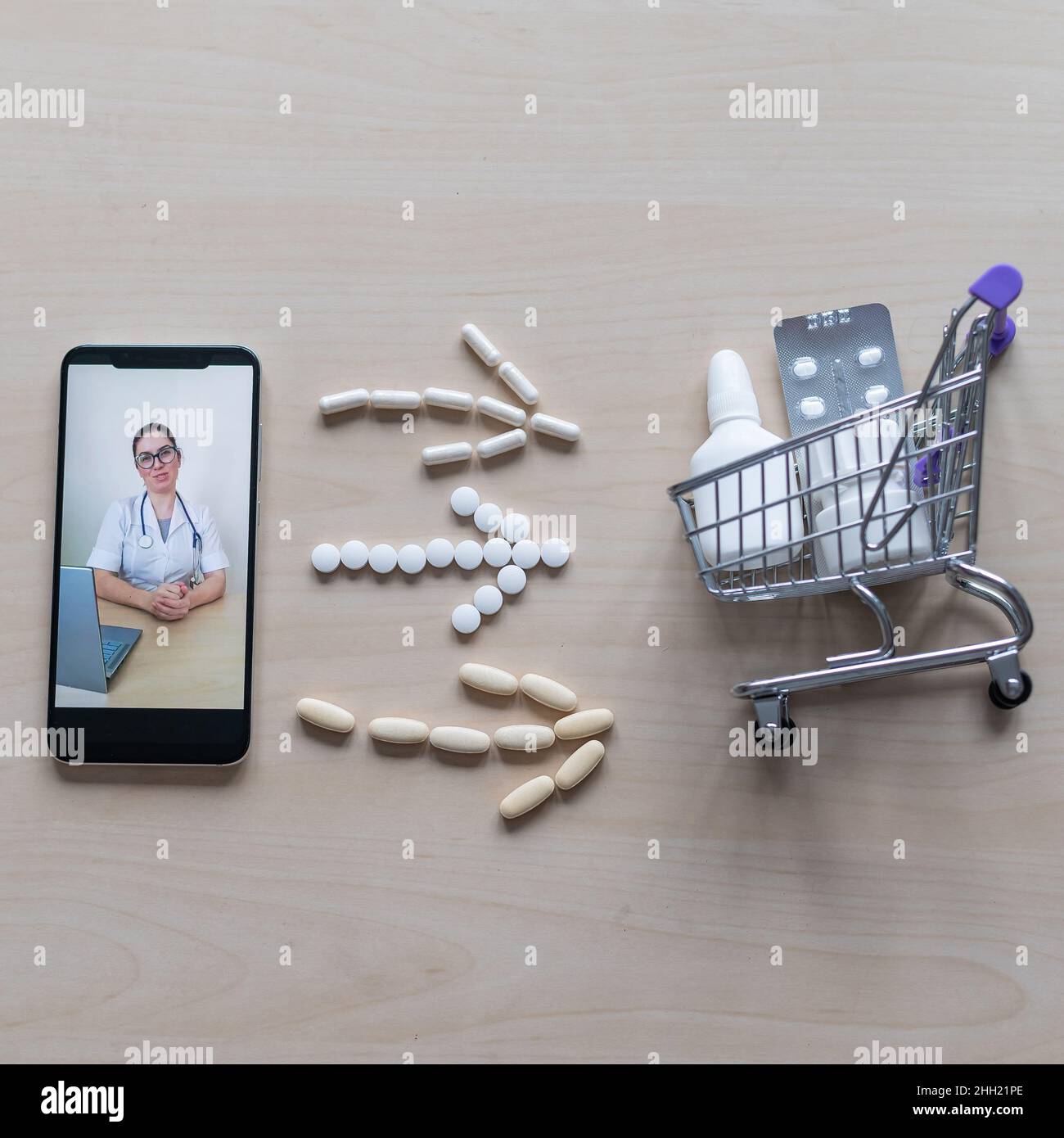 Friendly female doctor on a smartphone screen prescribes treatment ...