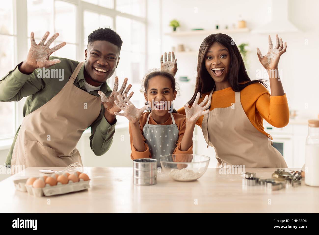 Black Family Baking Having Fun Making Growling Face In Kitchen Stock ...
