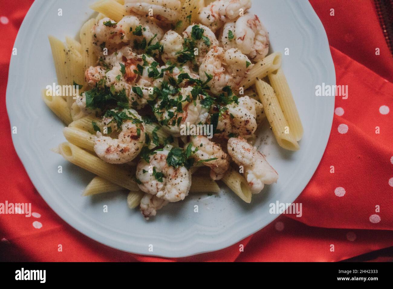 shrimp scampi with penne pasta Stock Photo - Alamy