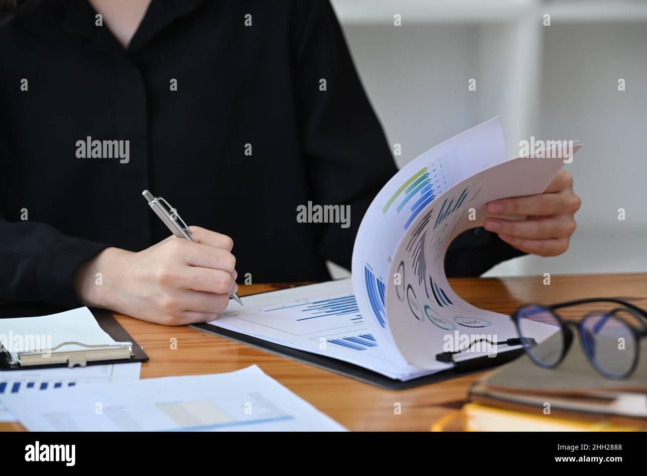 Communication signing document sitting holding hi-res stock photography ...