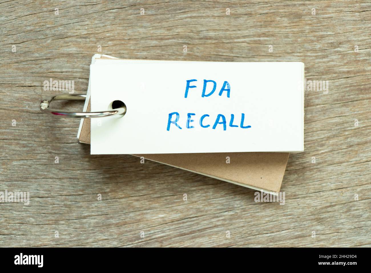 Flash card with handwriting word FDA recall on wood background Stock ...
