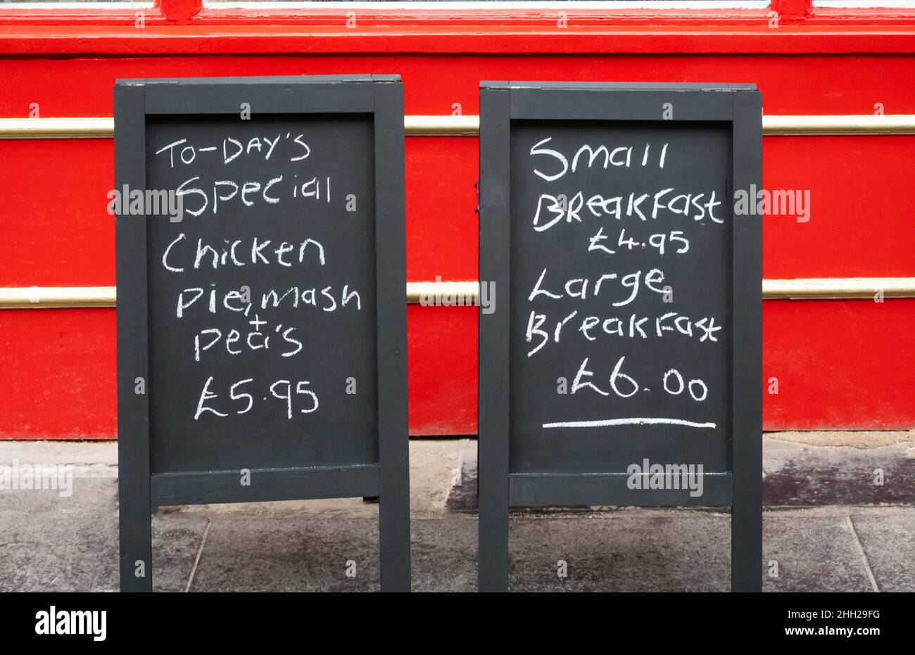 Two menu signs outside a bistro in Liverpool Stock Photo - Alamy