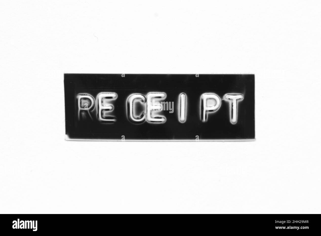 Black color banner that have embossed letter with word receipt on white ...