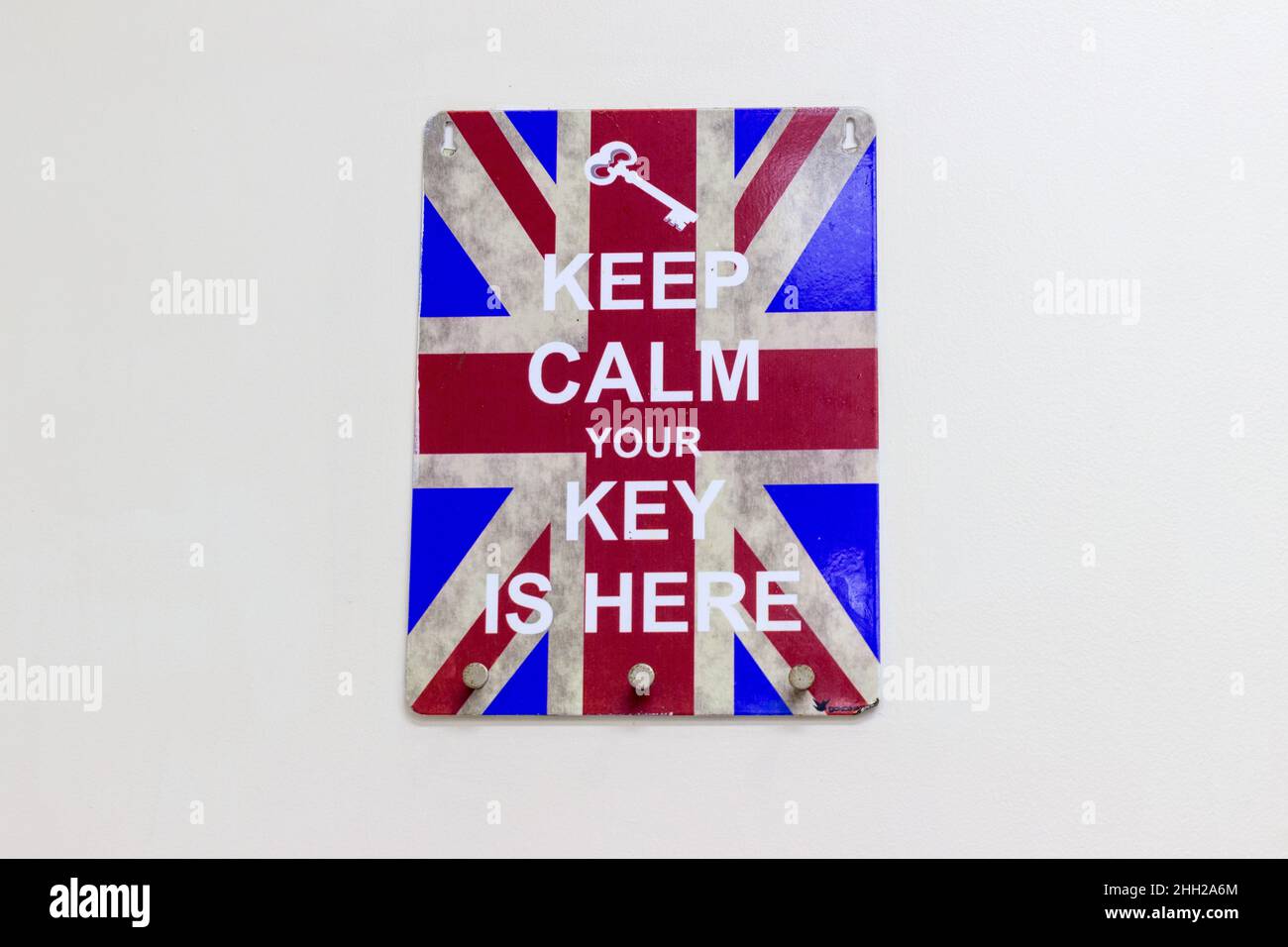 key holder on the written phrase Keep calm your key is here Stock Photo ...