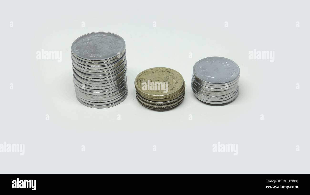Pile of Indian Rupee Coins. Two rupee and five rupee and one rupee ...