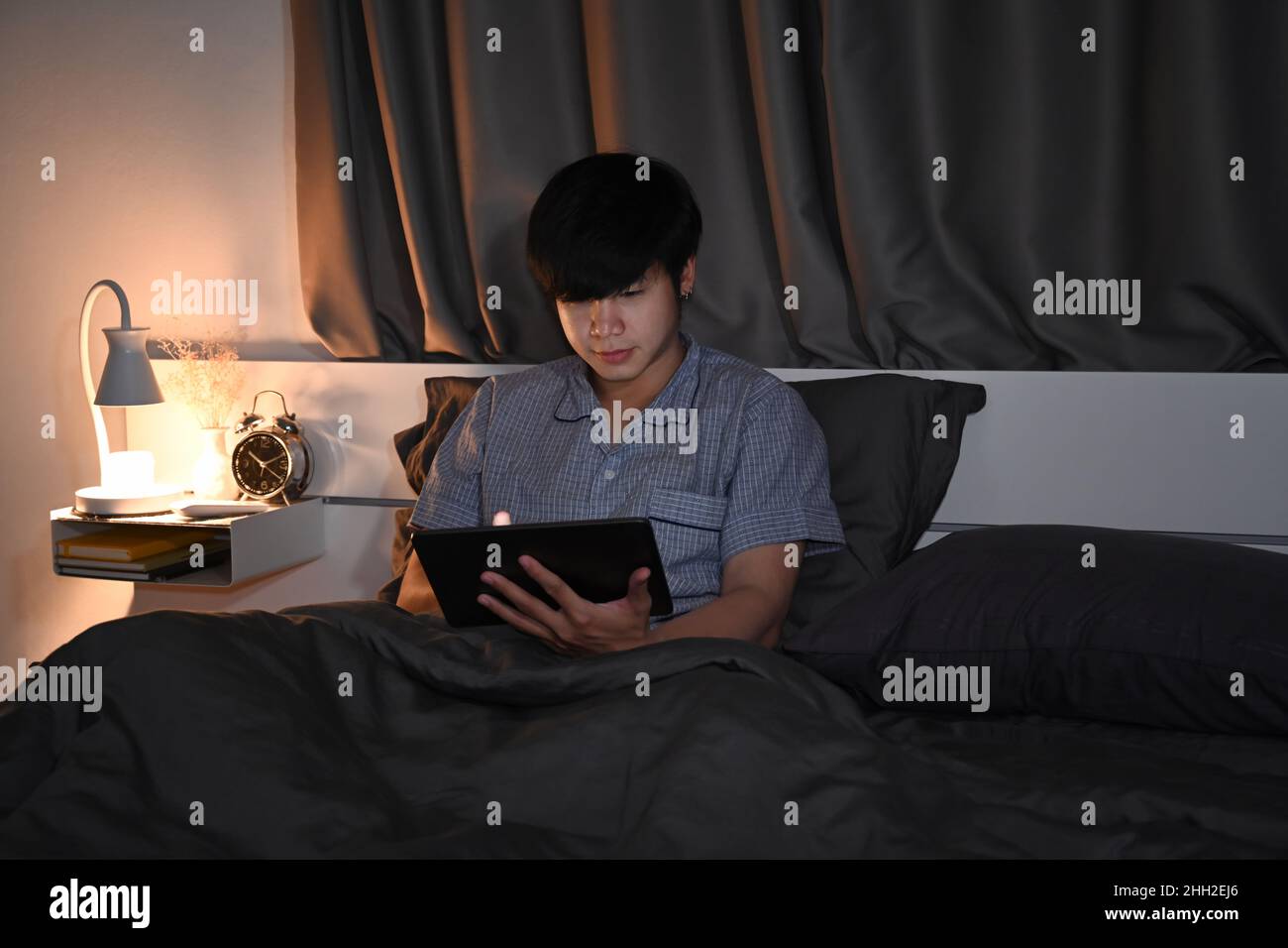 Businessman work in pajamas hi-res stock photography and images - Alamy