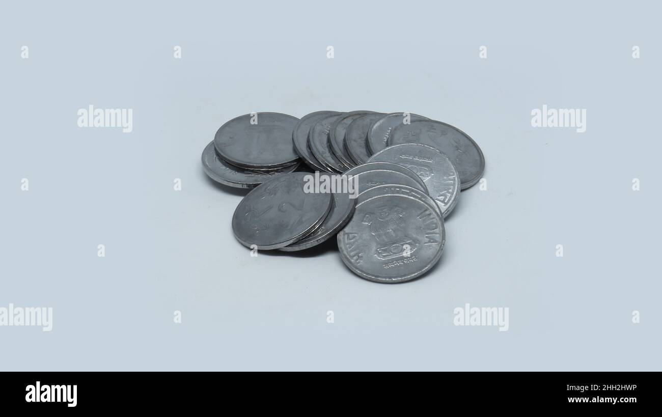 Pile of Indian Rupee Coins. Two rupee coins. On a white background ...