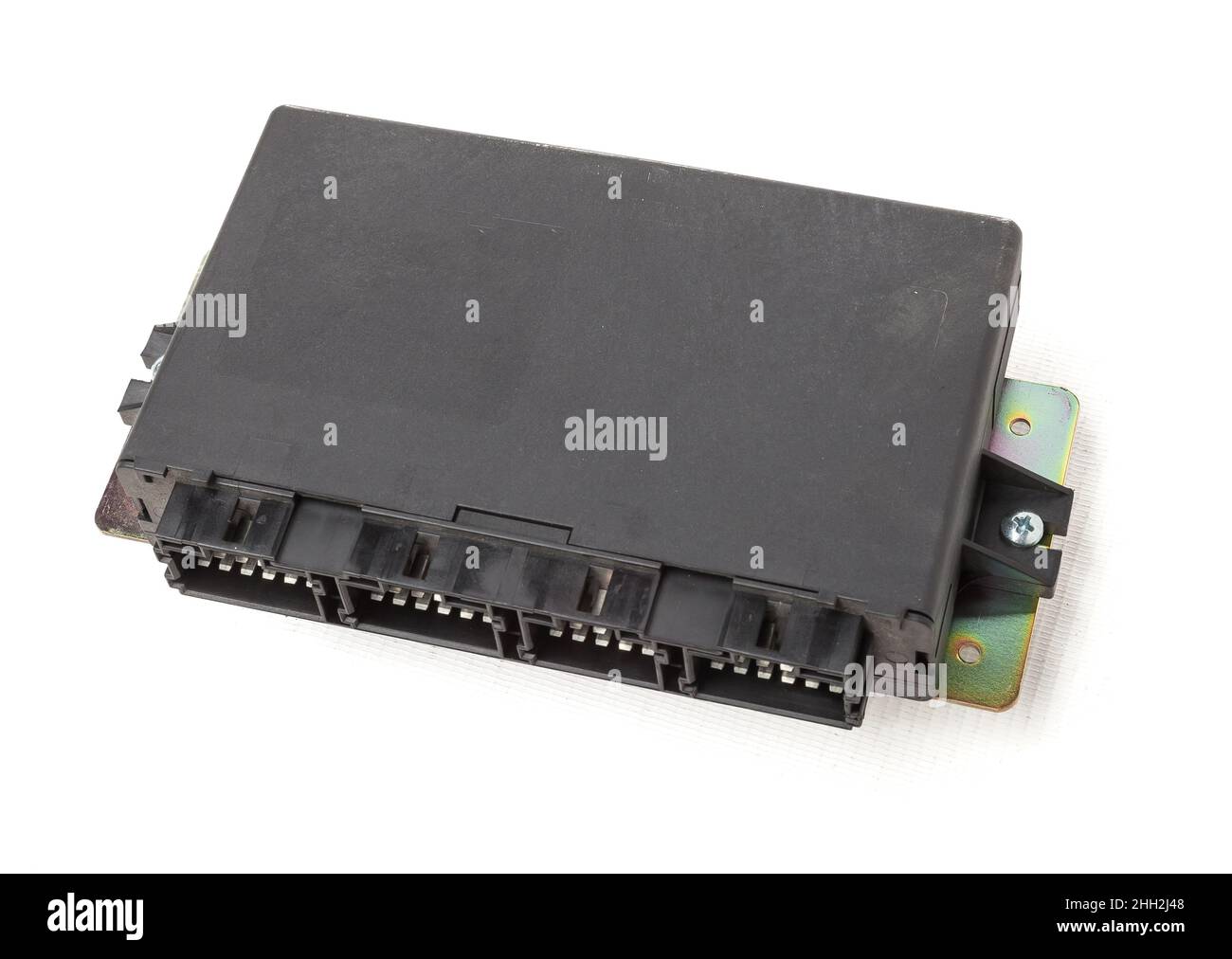 Plastic car engine control unit with plastic elements on a white ...